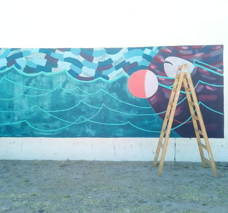 En el Puerto de SAE realizan uno de los "Murales en Eclipse" el fenómeno